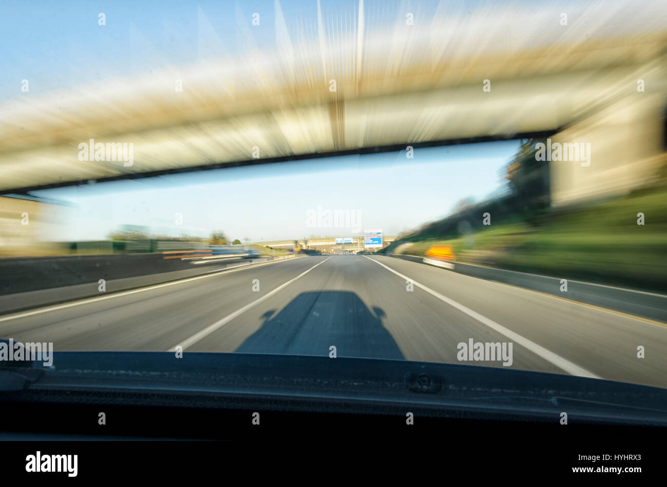 car-going-too-fast-on-the-highway-stock-photo-alamy