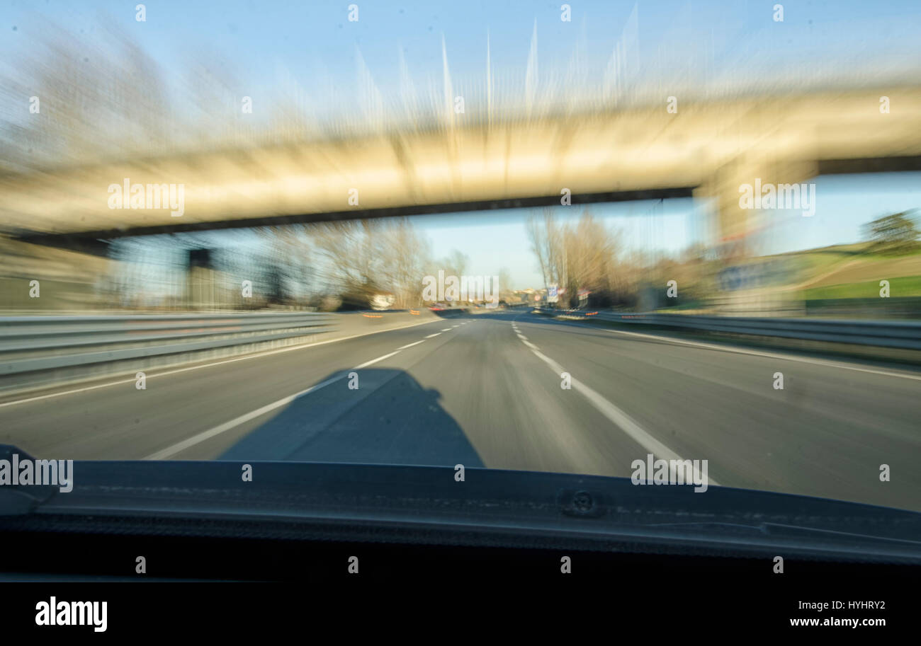 Car going too speedy on the freeway Stock Photo - Alamy