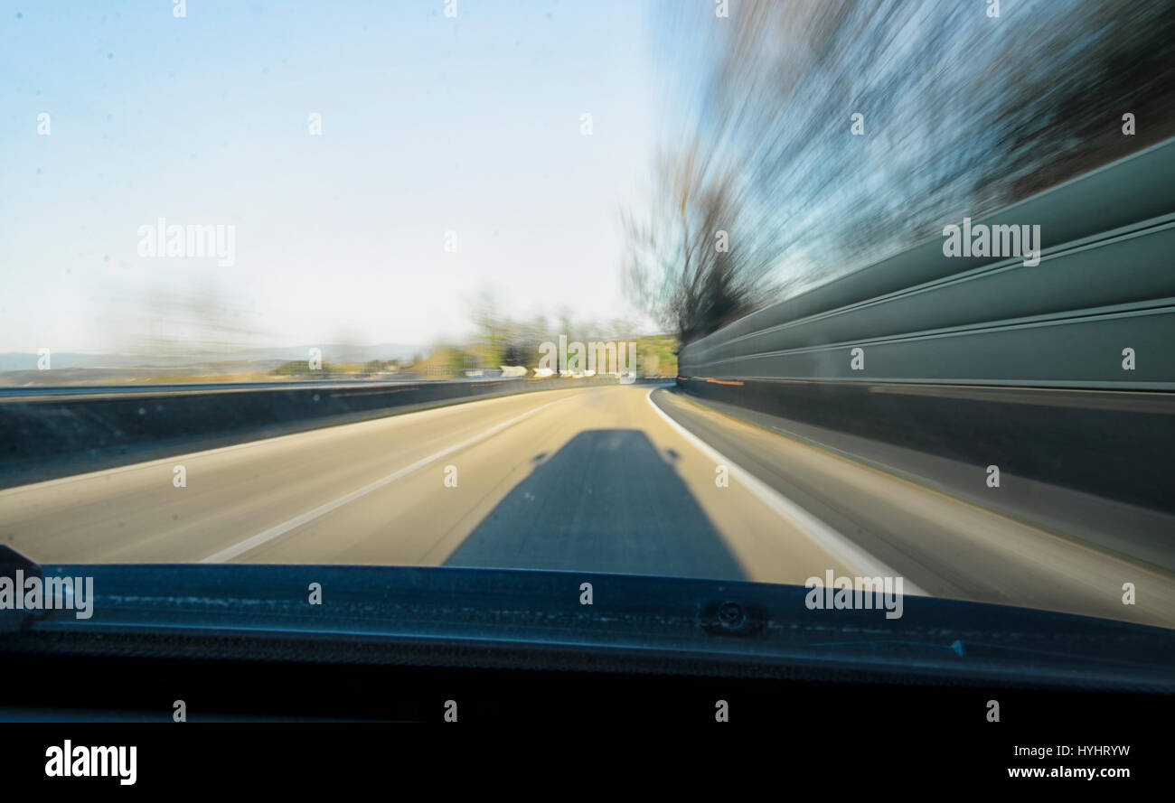 Car going too fast on the freeway Stock Photo - Alamy