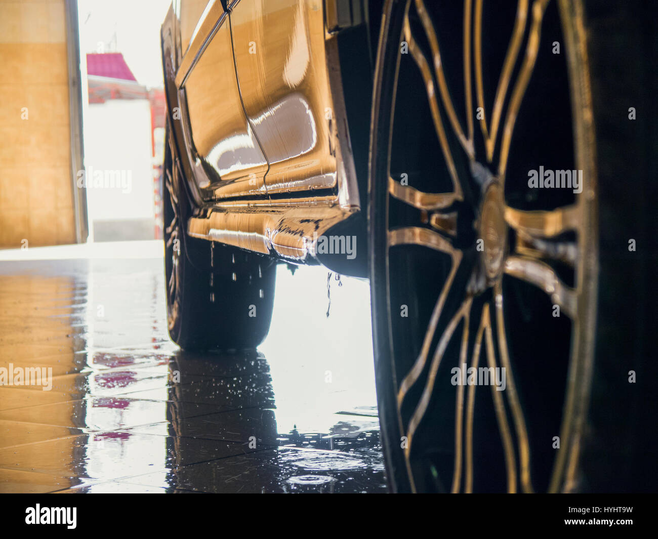 The wet clean car on car wash closeup Stock Photo - Alamy