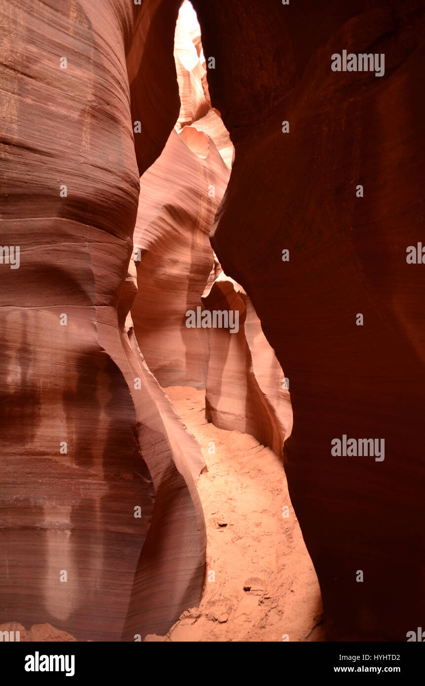 Softened red rock canyon carved out through the rock Stock Photo - Alamy