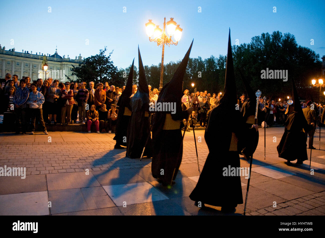Nazarenos during a Holy Week procession, Plaza de Oriente. Madrid ...