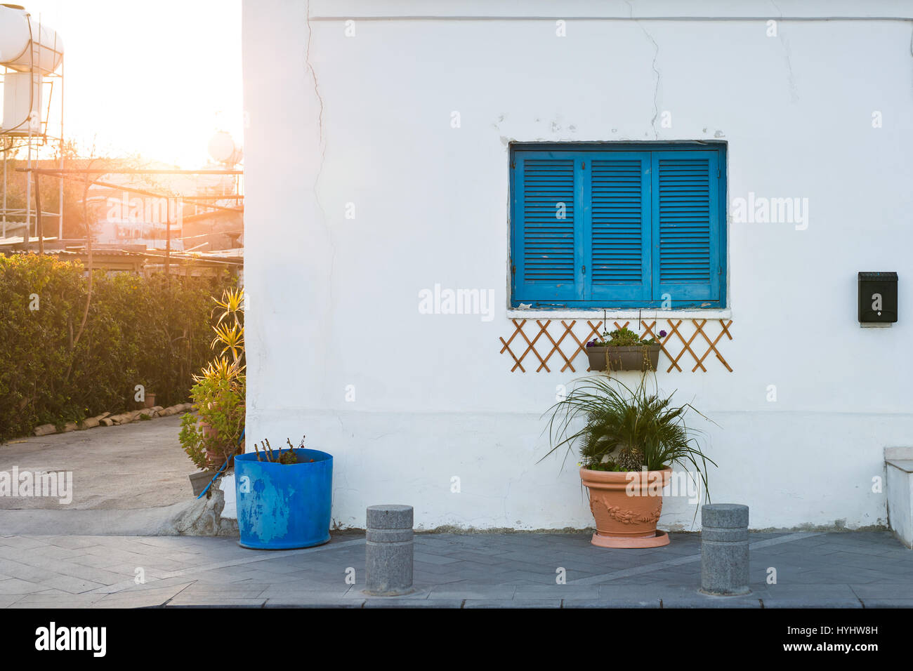 window and flower pot. House facade Stock Photo - Alamy