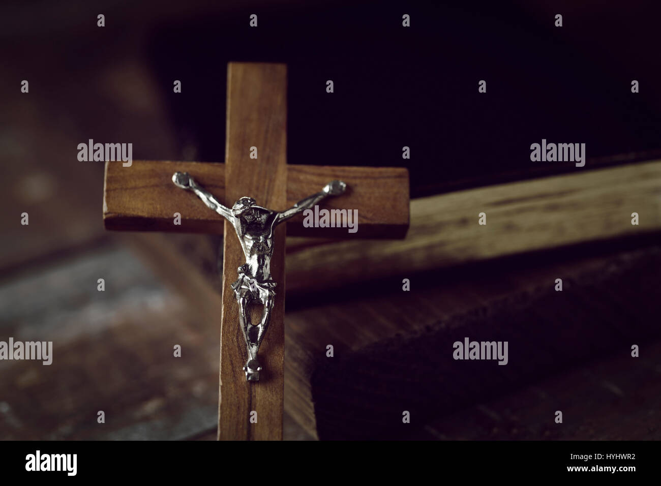 closeup of an old christian crucifix on a rustic wooden surface Stock ...