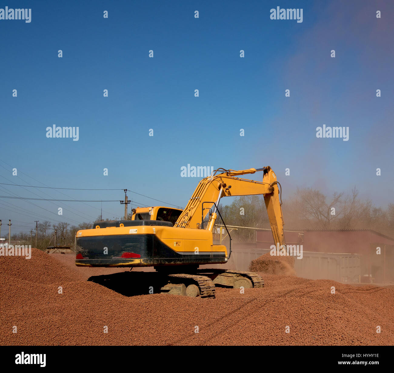 excavator loads materials Stock Photo - Alamy