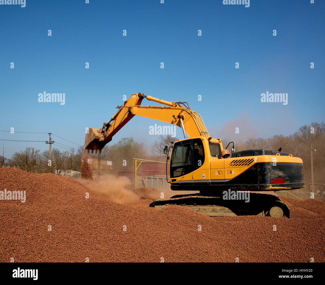 large excavator loads materials Stock Photo - Alamy