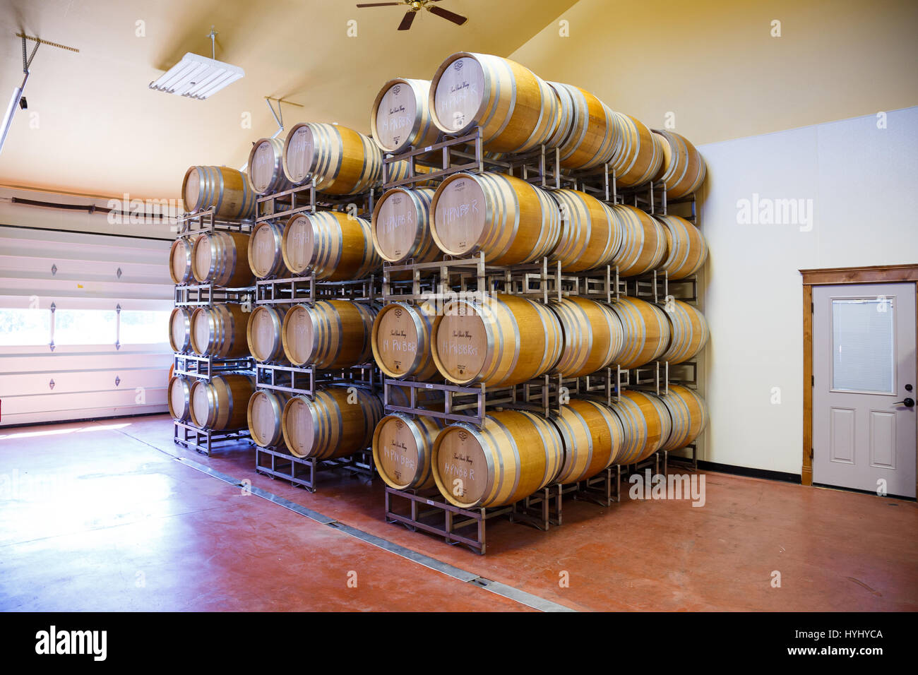 EUGENE, OR - MAY 2, 2015: Barrel room detail of large wine barrels ...
