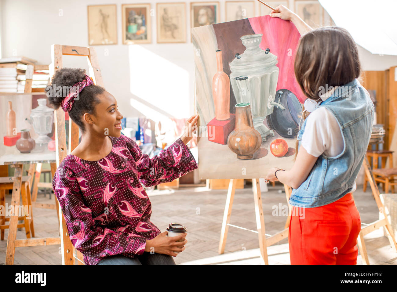 Creative students at the painting studio Stock Photo - Alamy