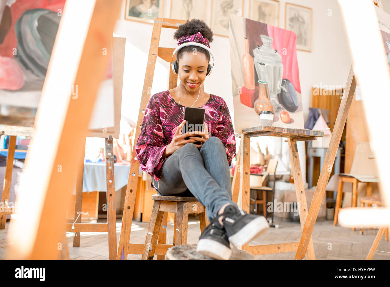 Creative student at the painting studio Stock Photo - Alamy