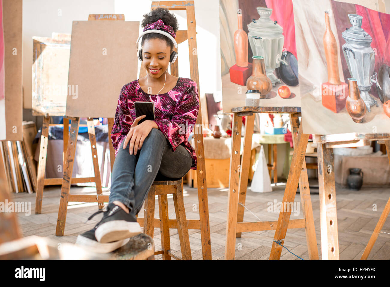 Creative student at the painting studio Stock Photo - Alamy