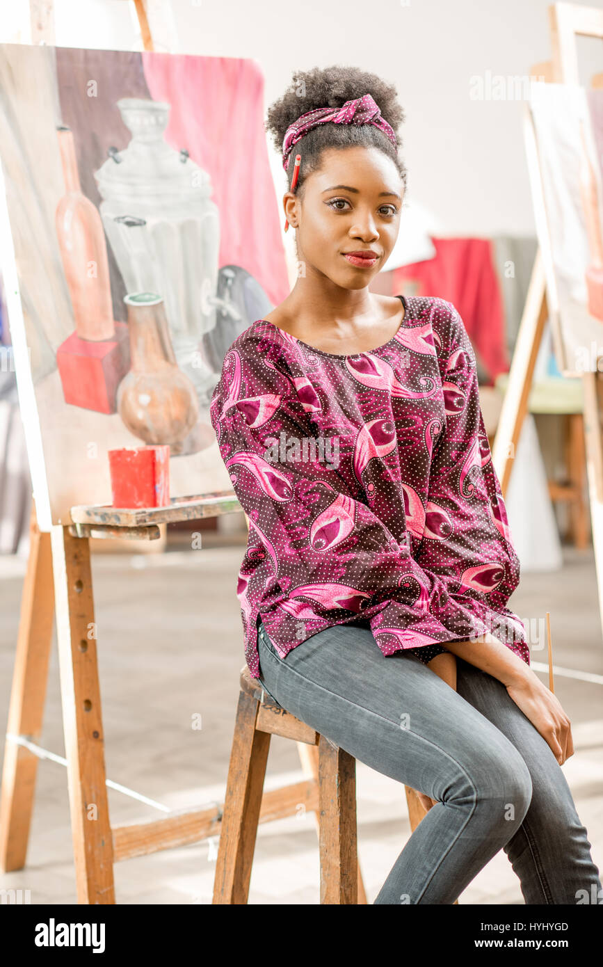 Creative student at the painting studio Stock Photo - Alamy