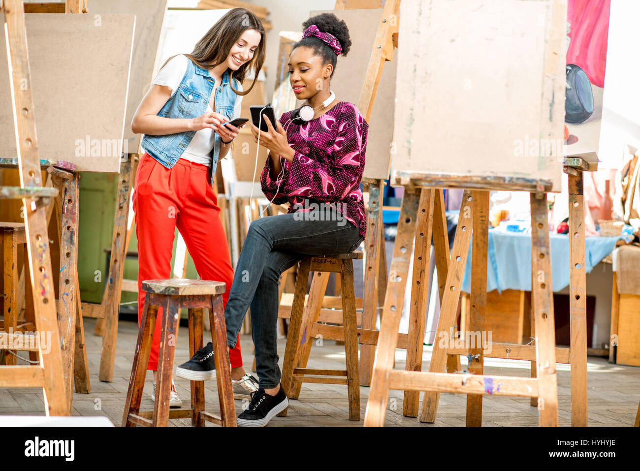 Creative students during the break at university Stock Photo - Alamy