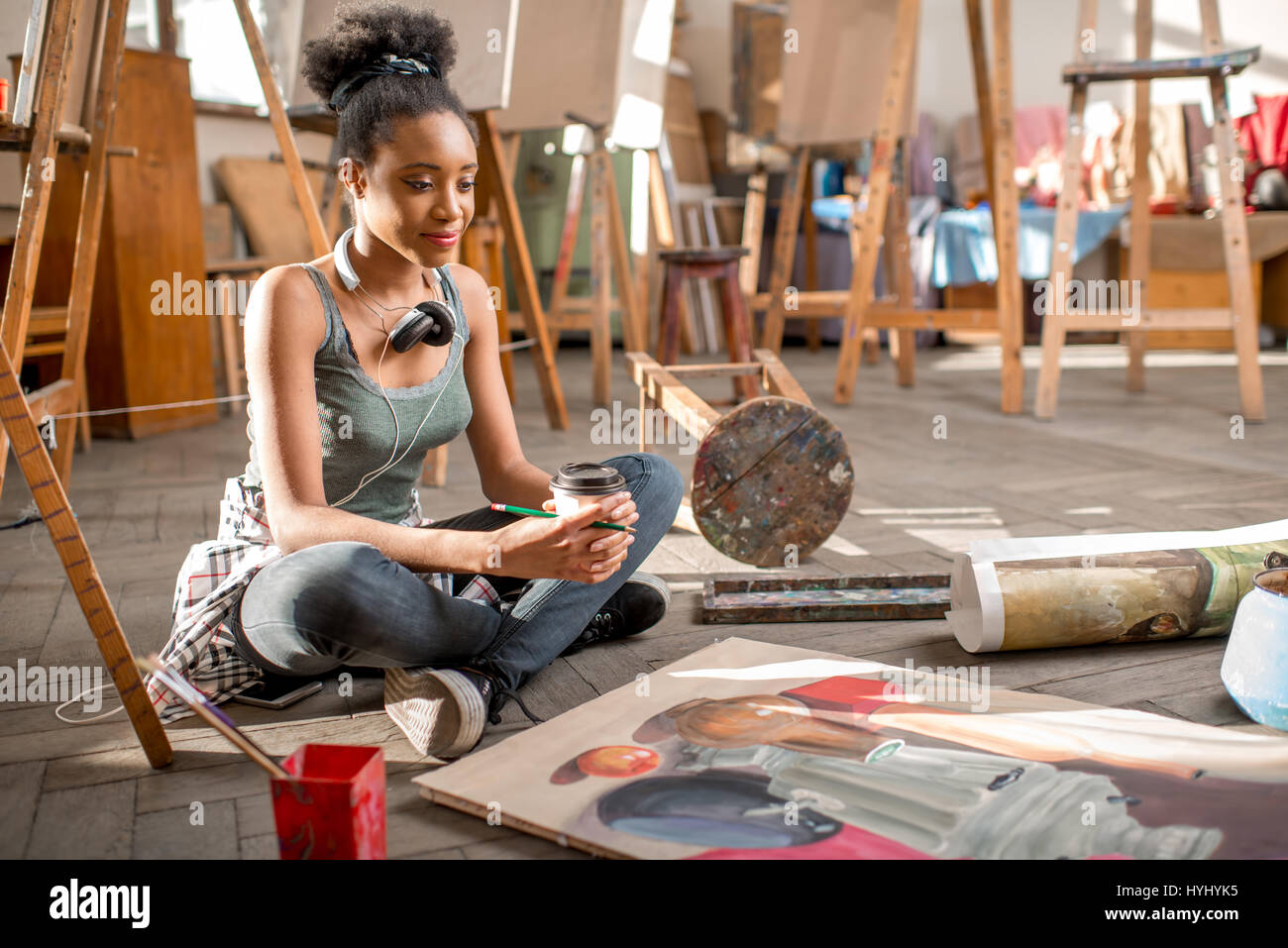 Creative student painting at the university Stock Photo - Alamy