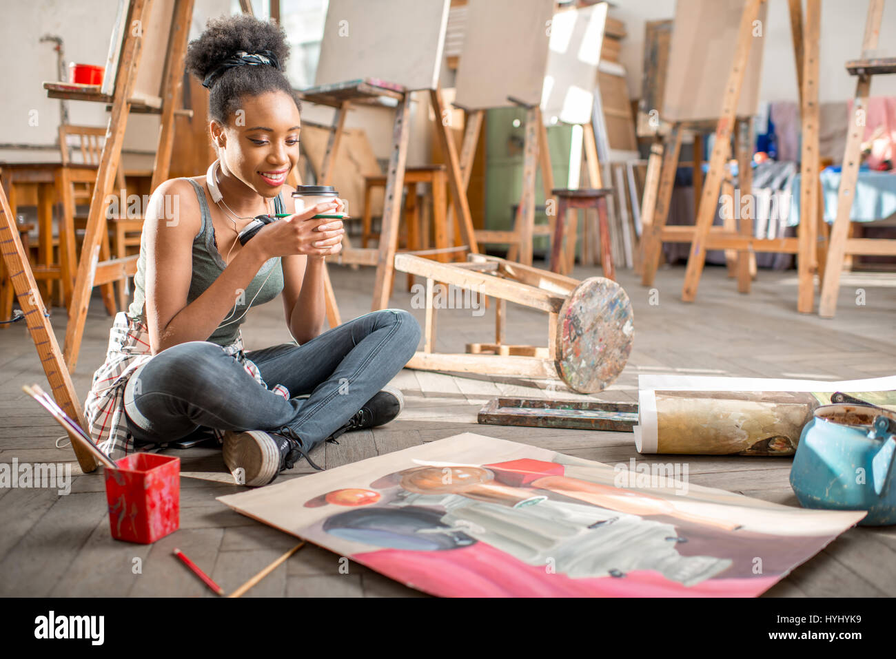 Creative student painting at the university Stock Photo - Alamy