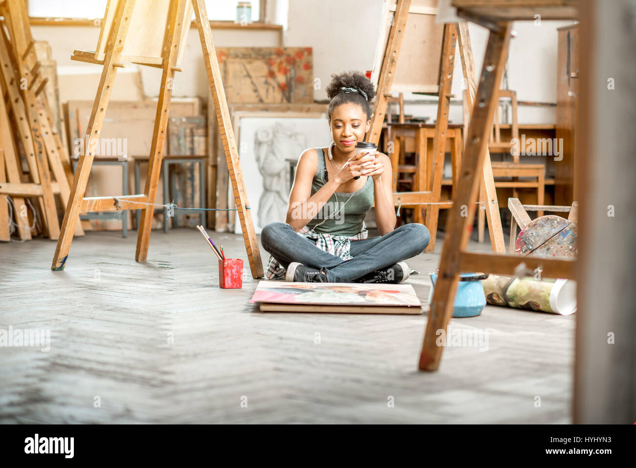Creative student painting at the university Stock Photo - Alamy