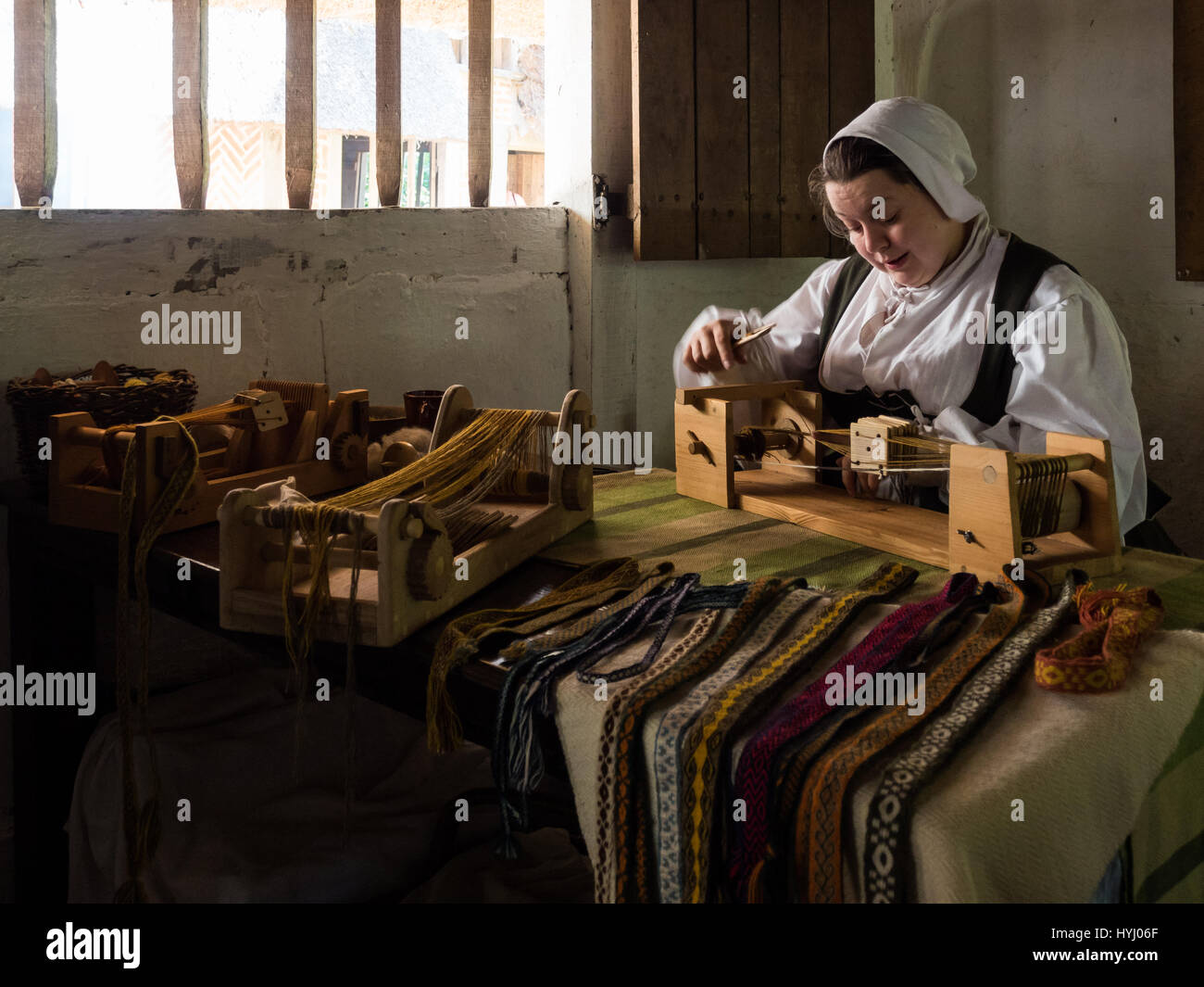 Lady box weaving at the Living History Village of Little Woodham in the ...