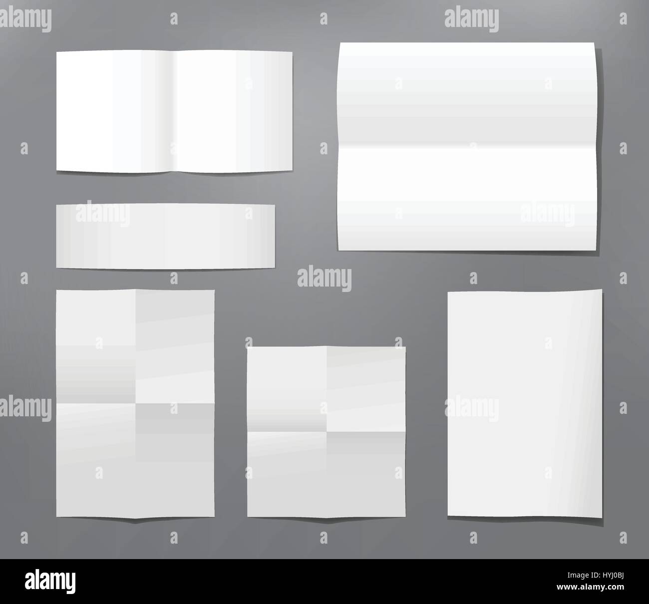 Folded white paper flyer, letter, brochure, leaflet with shadow on dark ...