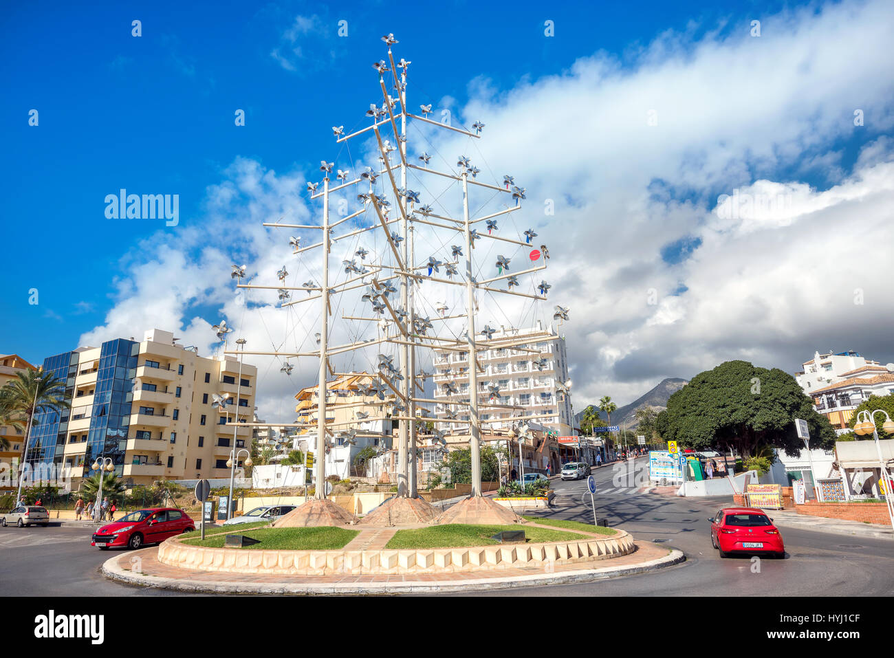 Cityscape with windmill on traffic roundabout. Benalmadena, Spain Stock ...