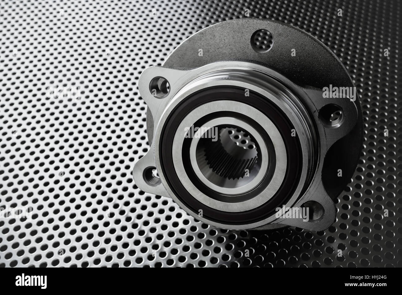 Composition of the car wheel bearing on metal surface Stock Photo - Alamy