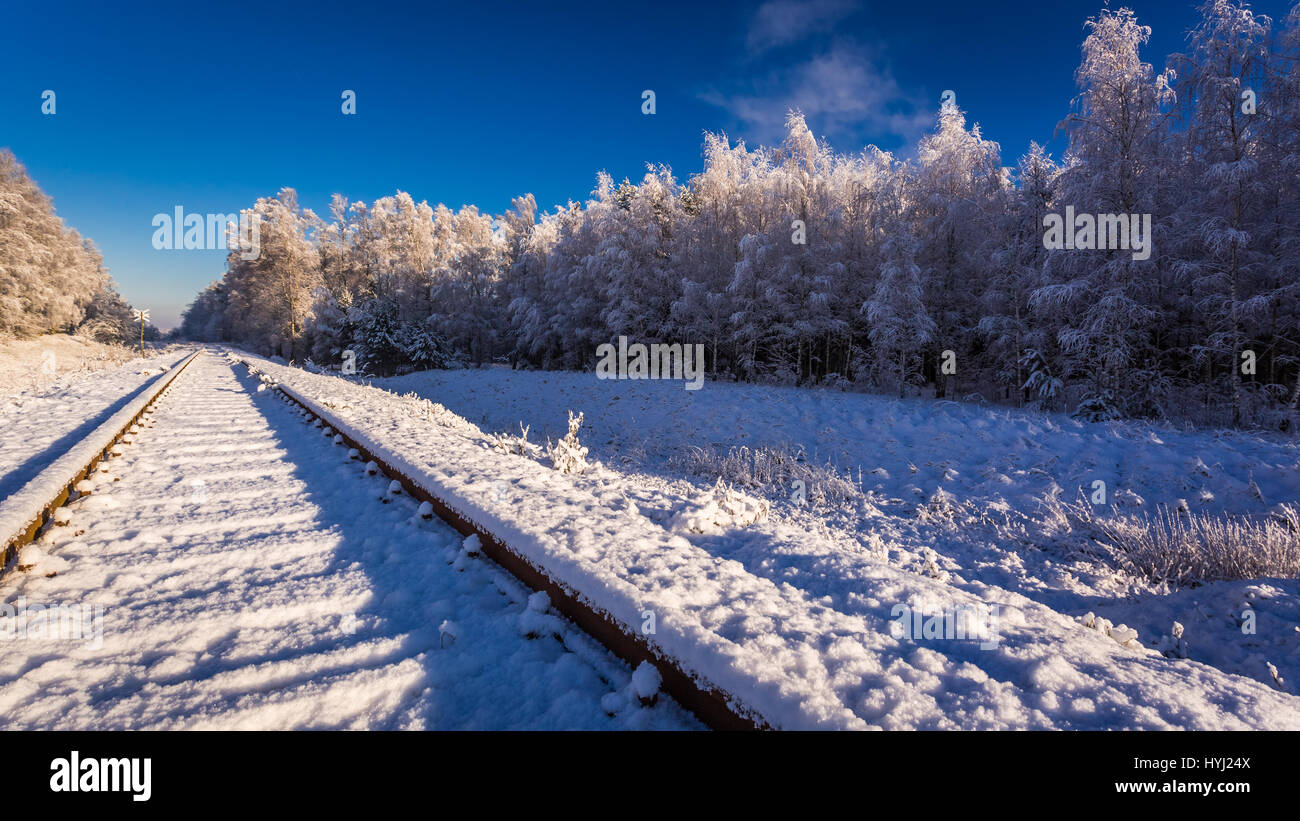 Frozen railway line in winter at sunrise, Poland Stock Photo - Alamy