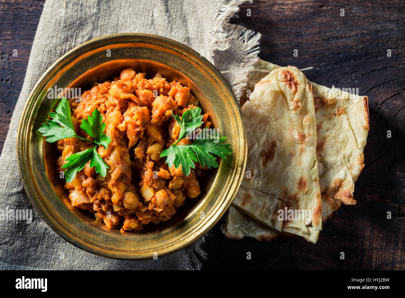 Indian Channa Masala with chickpeas and Naan bread Stock Photo - Alamy