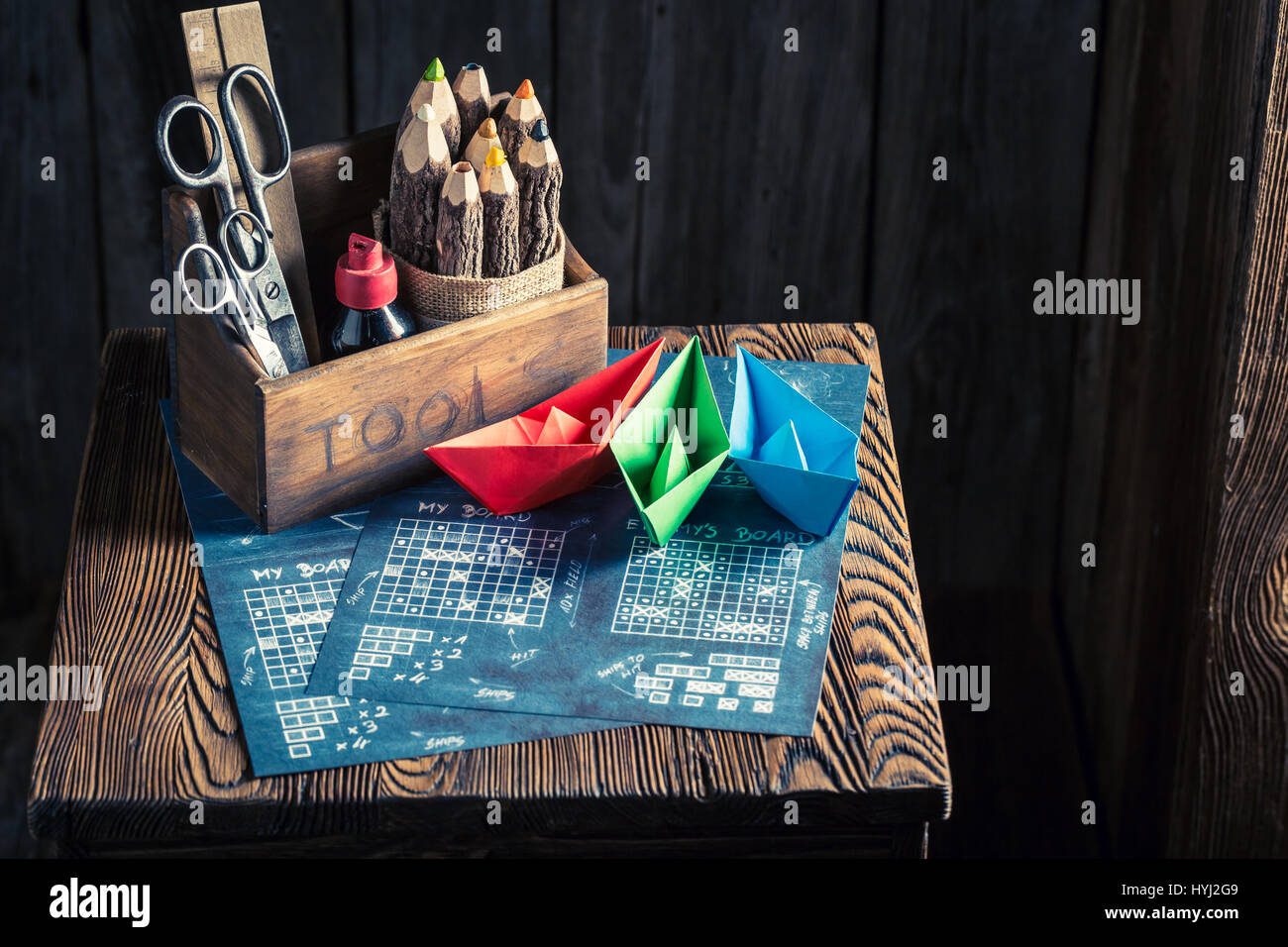 Vintage battleship paper game prepared to a battle Stock Photo - Alamy
