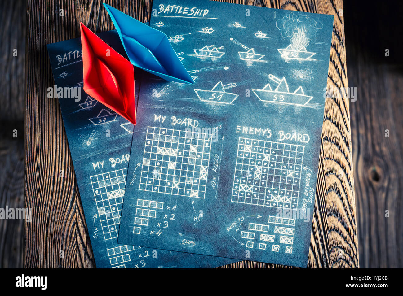Children's battleship paper game for two players Stock Photo - Alamy