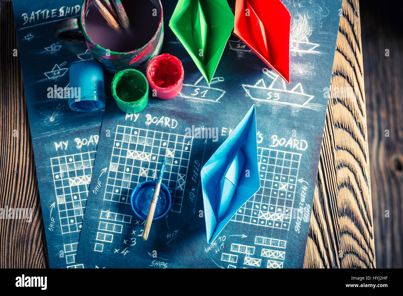 Retro battleship paper game with red and blue ships Stock Photo - Alamy