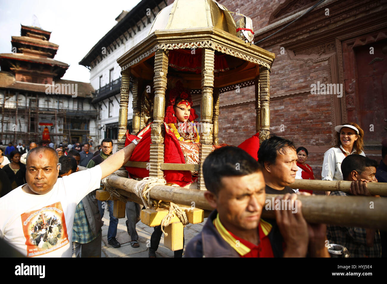 Kathmandu, Nepal. 4th Apr, 2017. Living Goddess Kumari is carried in a ...