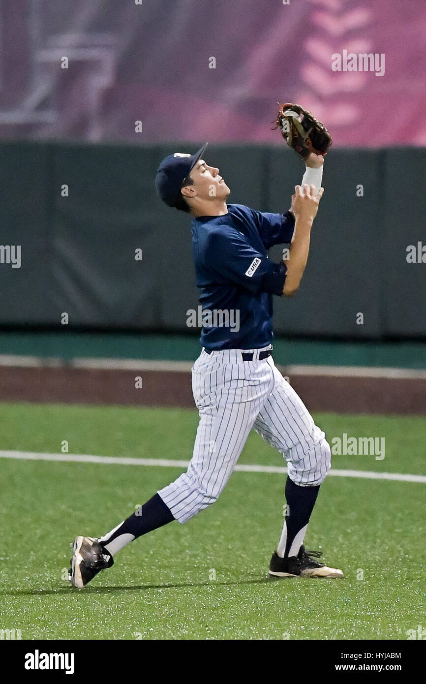 HOUSTON -- Rice outfielder Charlie Warren (5) makes the catch for the ...