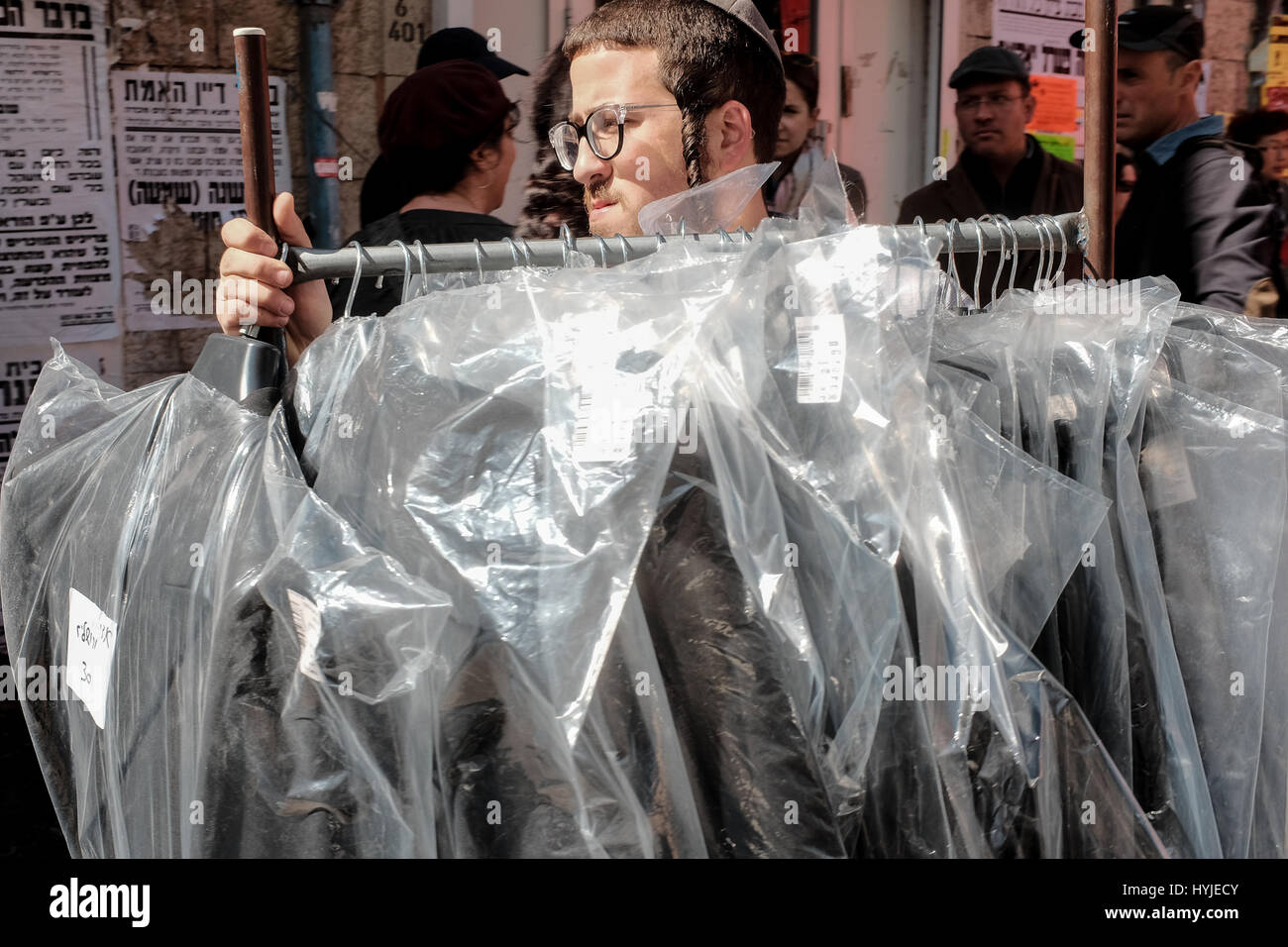 Jerusalem, Israel. 5th April, 2017. A young man delivers dry cleaned ...