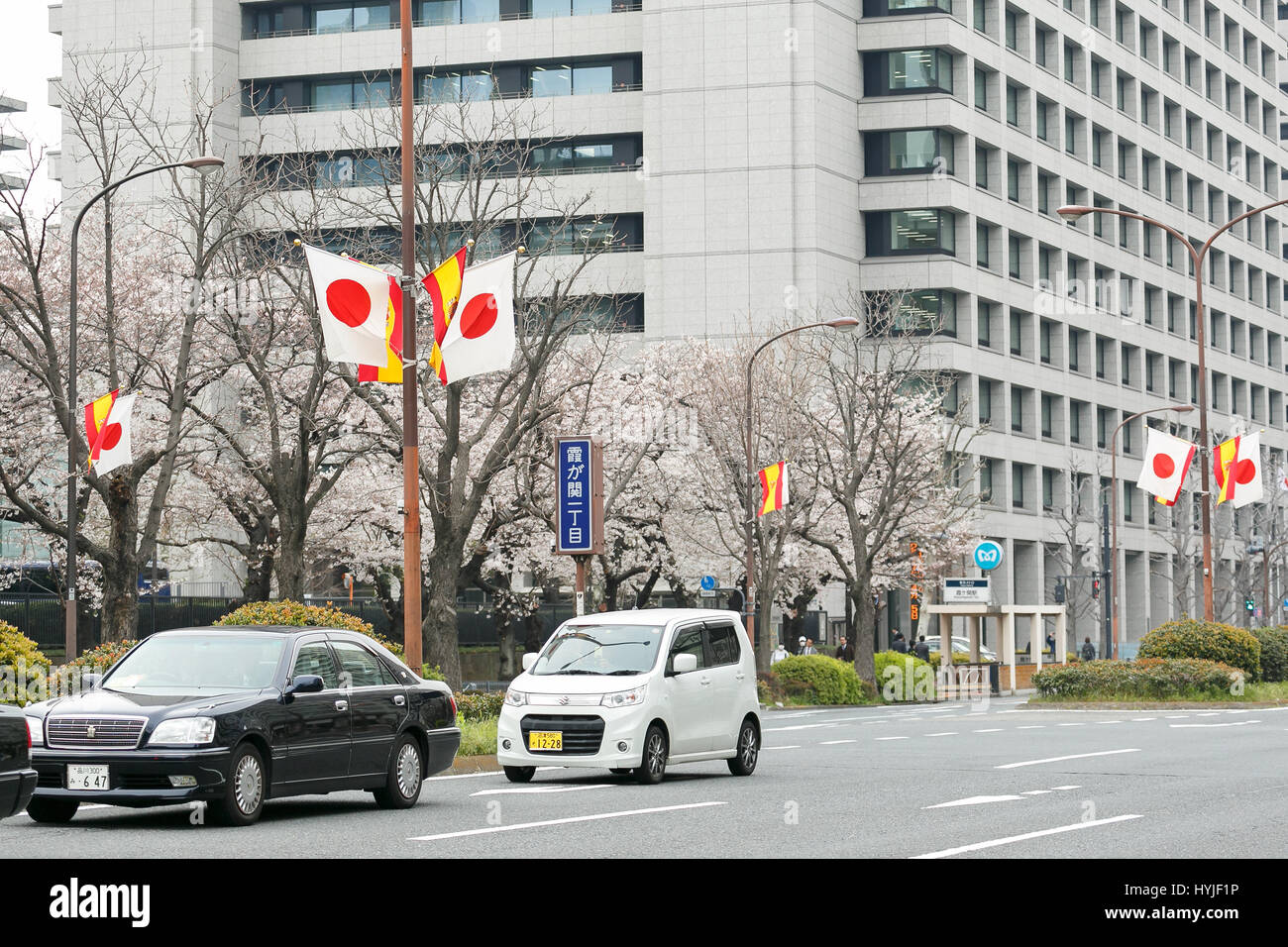 Spanish and Japanese national flags are seen outside the Ministry of ...