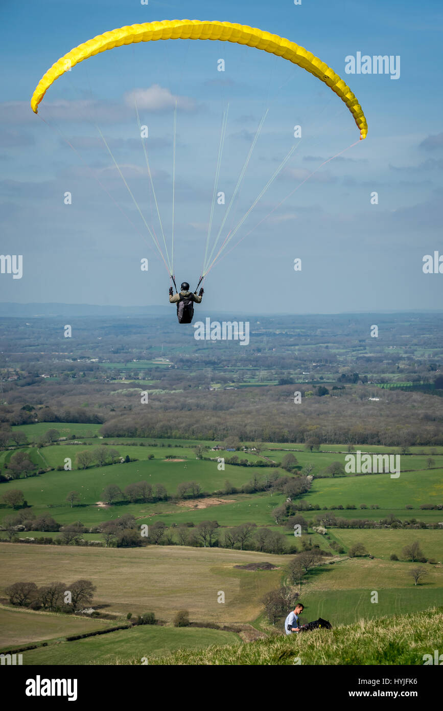 Sussex, UK. 5th April, 2017. Parascender taking off over the weald of ...