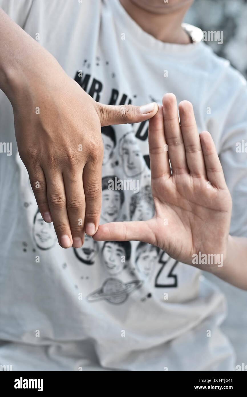 Human hands creating various shapes hi-res stock photography and images ...
