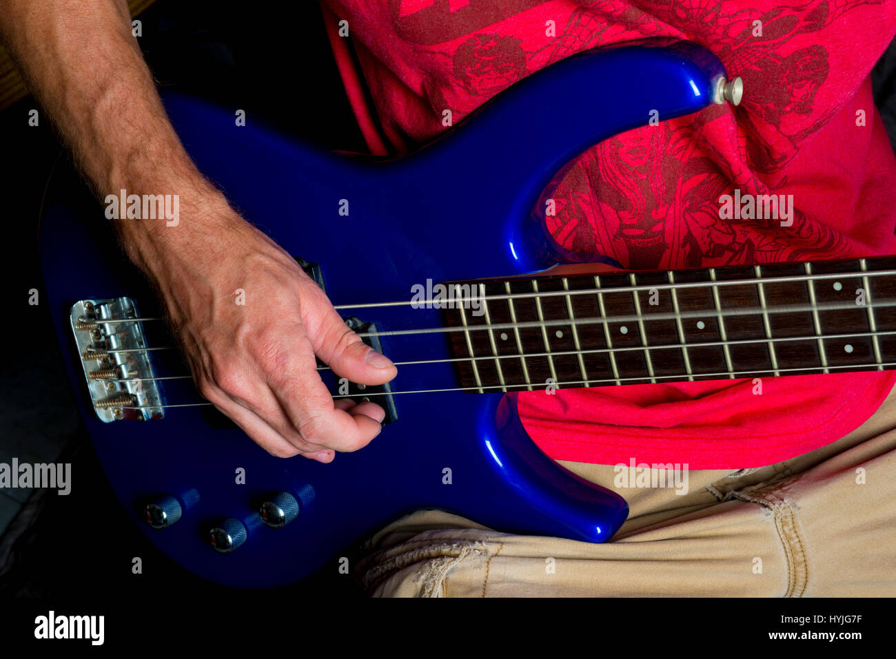 playing bass electric guitar Stock Photo - Alamy