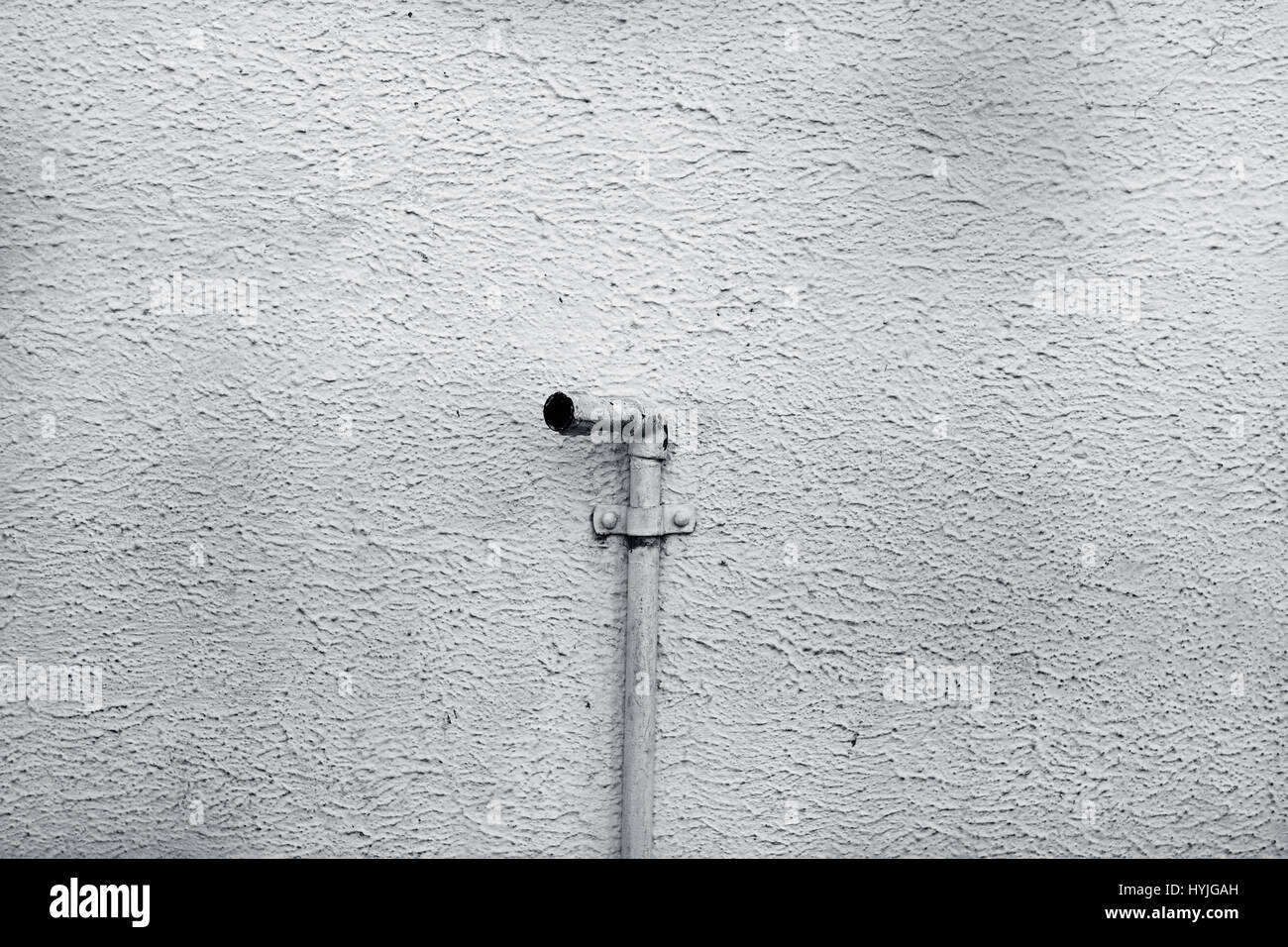 Pipe on the wall. Concept of Minimalism Stock Photo - Alamy