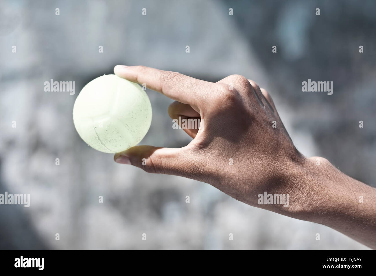 a boy having a ball in his hand Stock Photo - Alamy