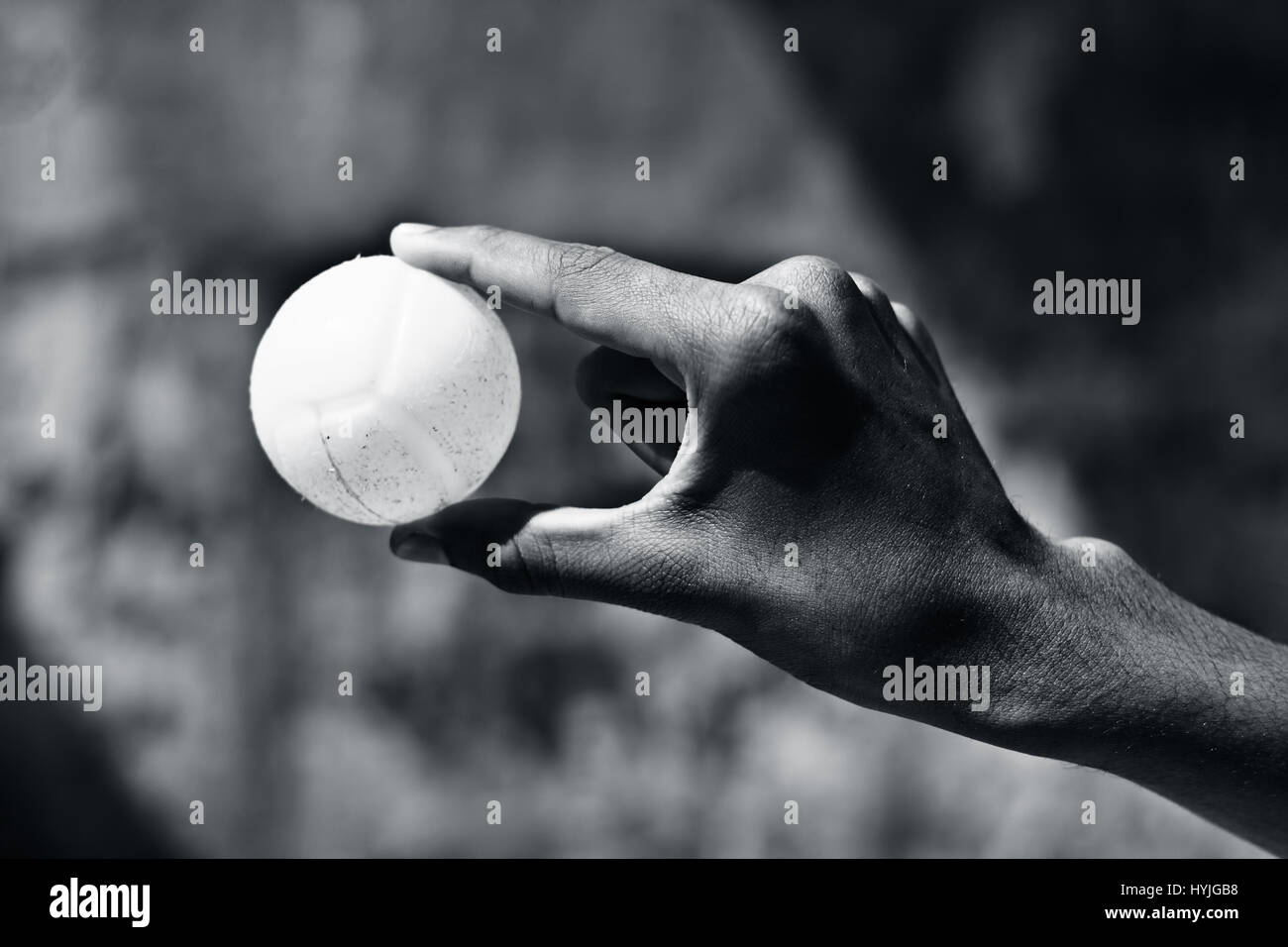 a boy having a ball in his hand Stock Photo - Alamy