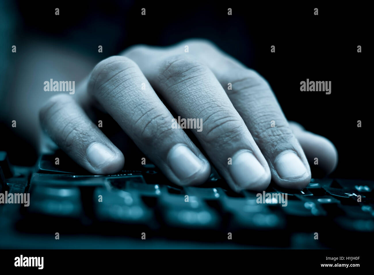Human hand on keyboard,isolated, selective focus, shallow depth of ...