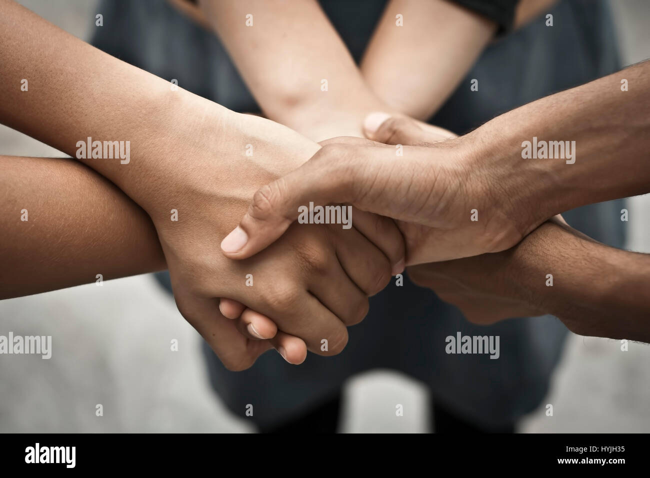 Team work : Three human hands join together Stock Photo - Alamy