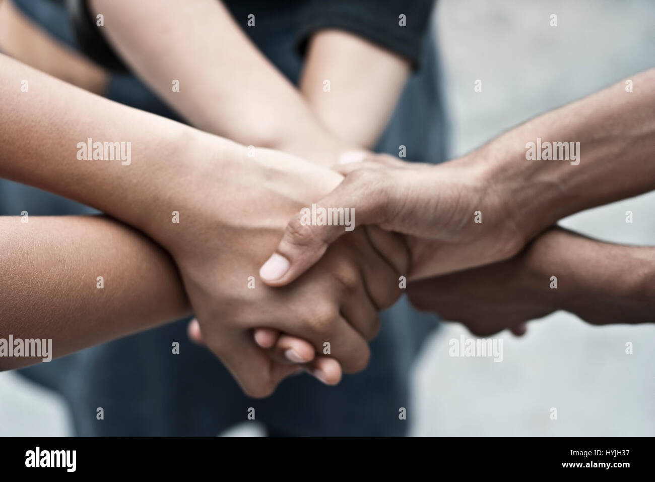Team work : Three human hands join together Stock Photo - Alamy