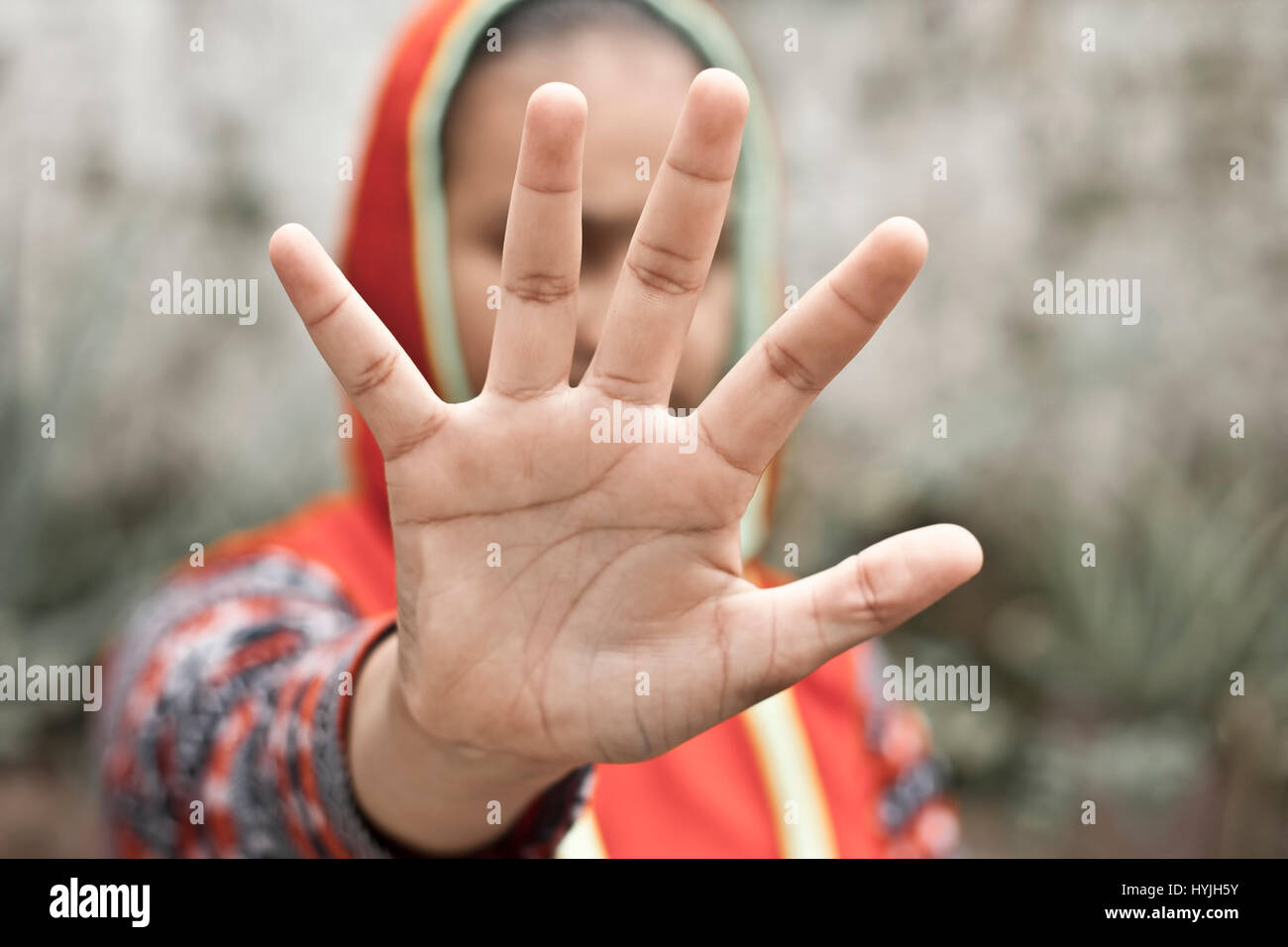 A girl saying no to camera Stock Photo - Alamy