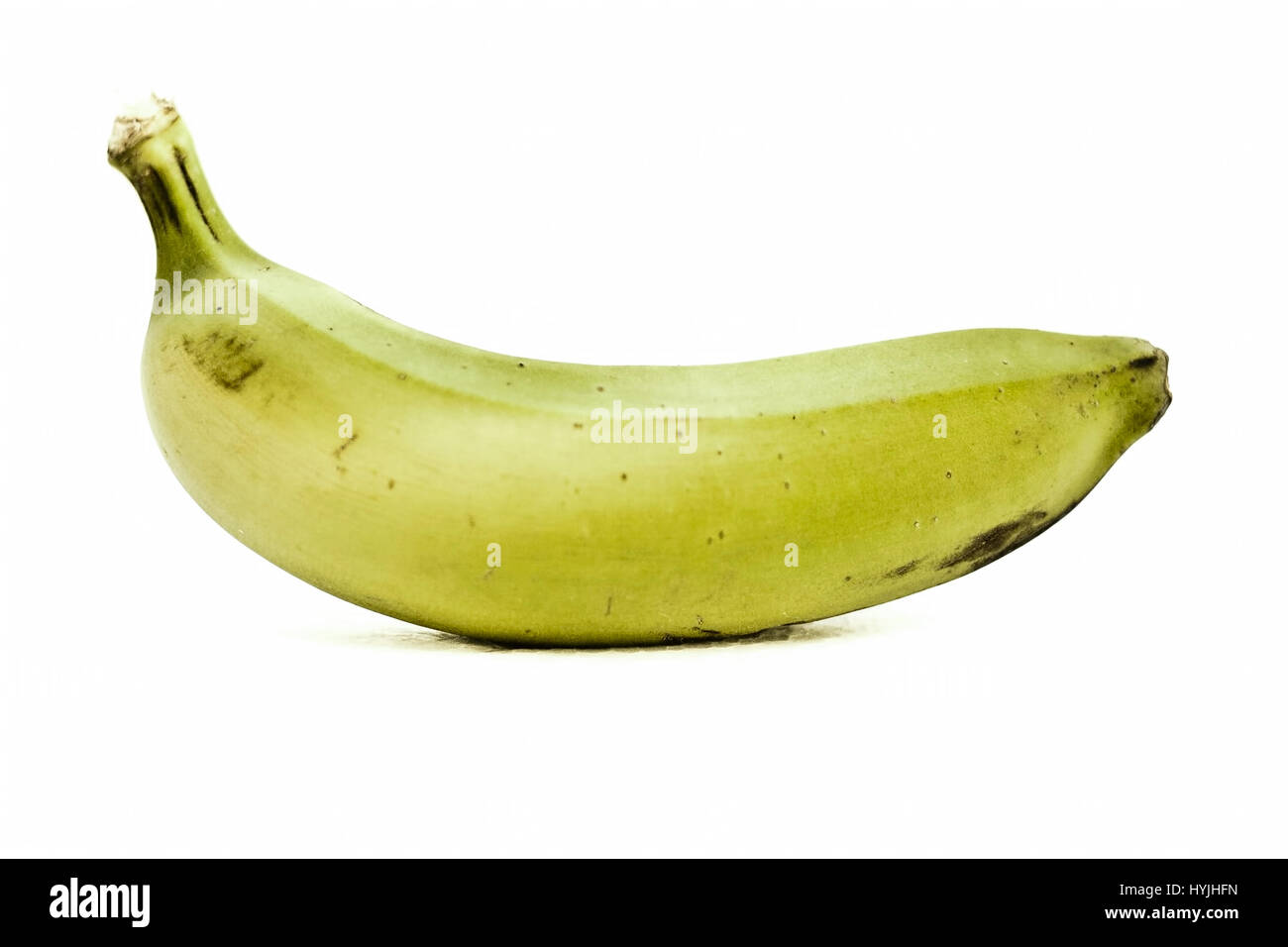 Half ripe Banana isolated on white Stock Photo - Alamy