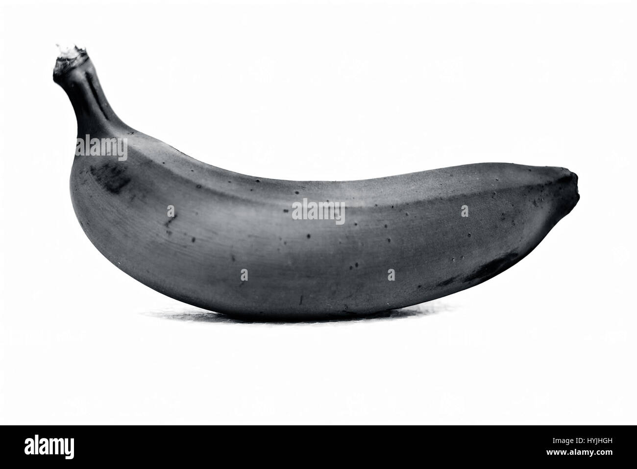 Half ripe Banana isolated on white Stock Photo - Alamy
