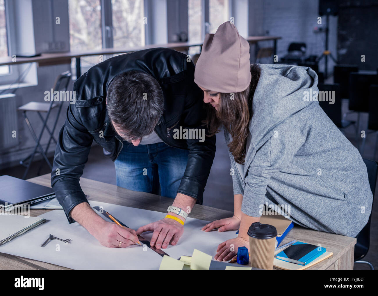 Team of architects people drawing construction project with pencil and ...