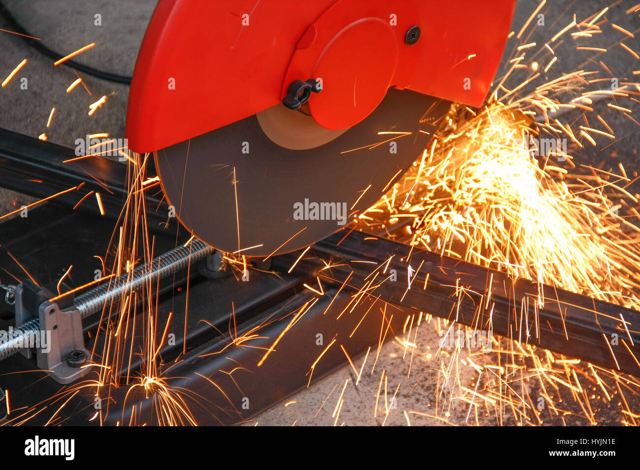 cutting steel with grinder machine close up Stock Photo - Alamy