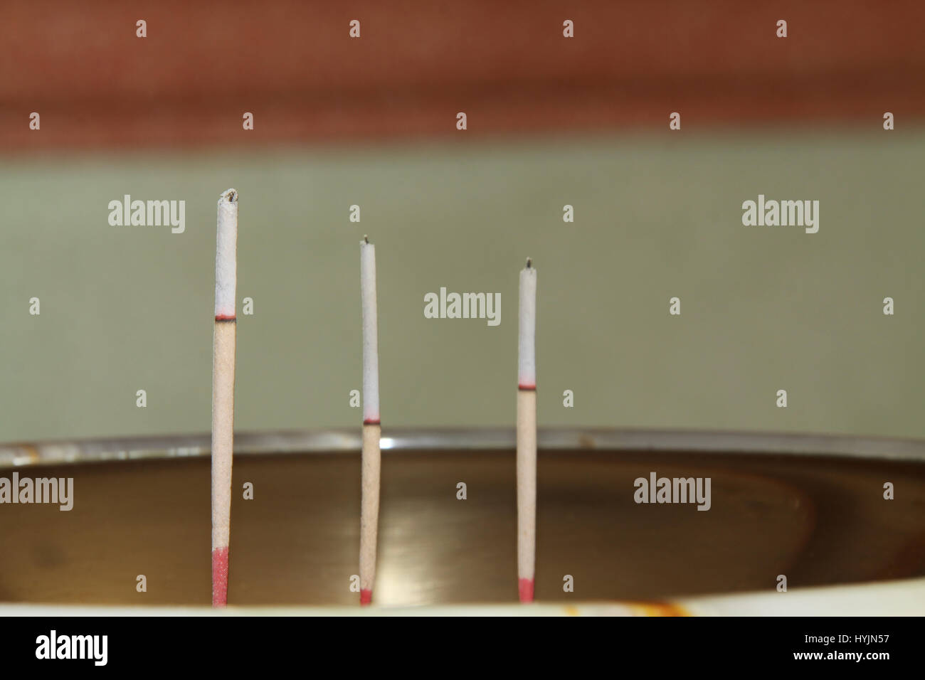 Incense stick with smoke floating around Stock Photo - Alamy