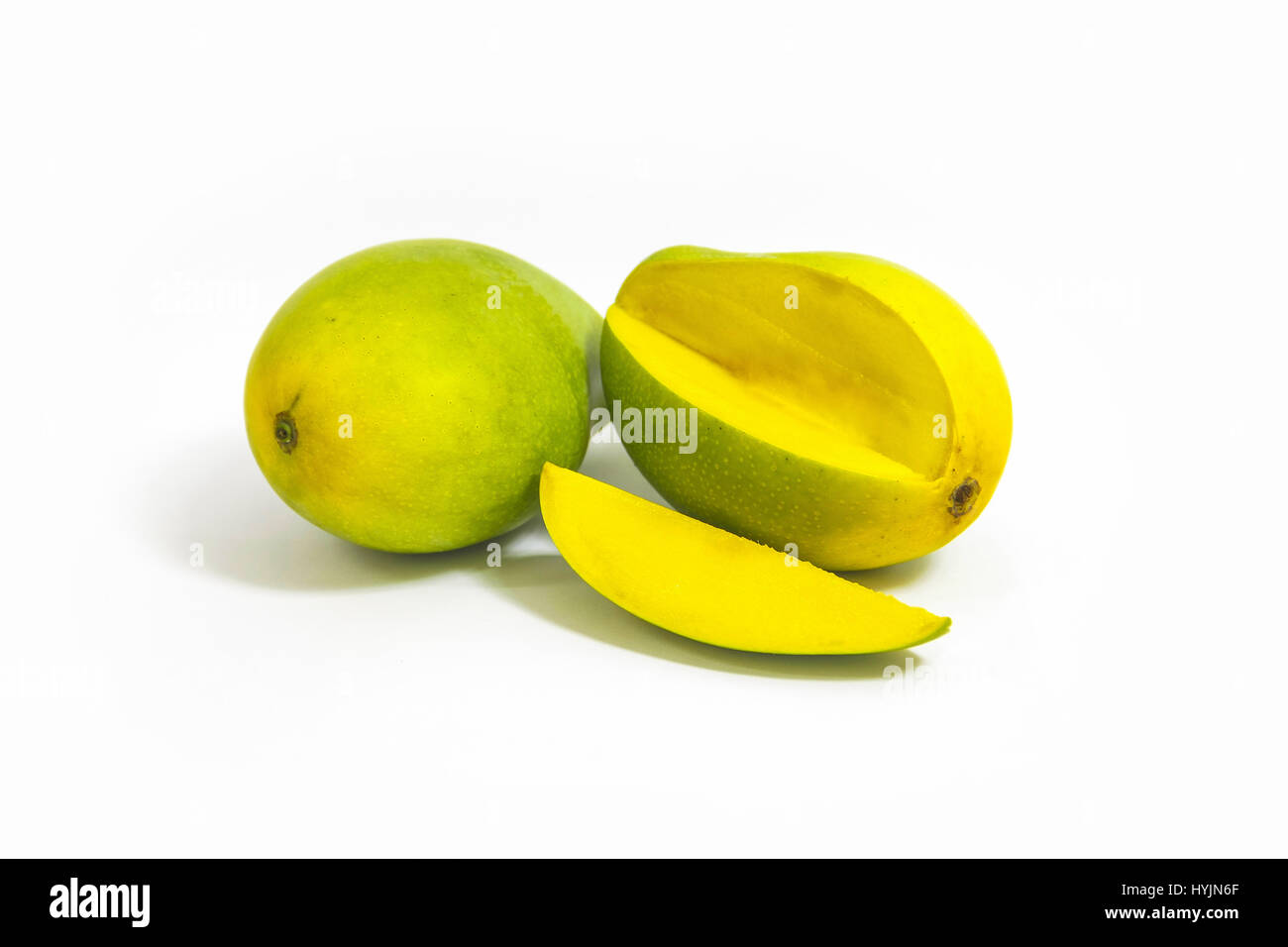 beautiful and appetizing of green-yellow mangoes on white background ...
