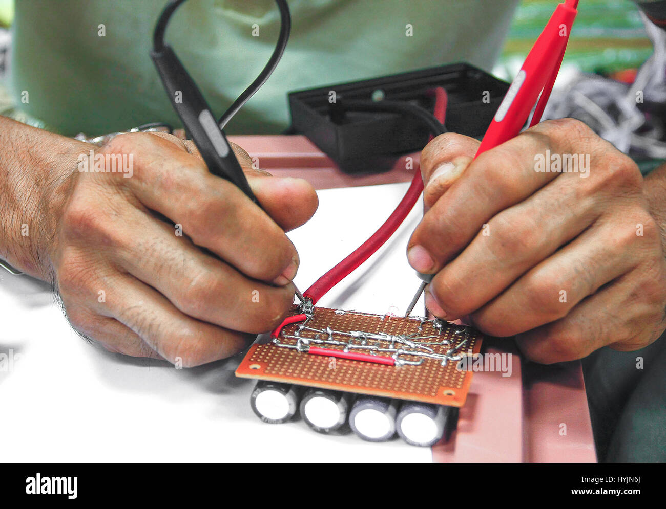 Electronics technician measurement circuit on electronic panel Stock ...