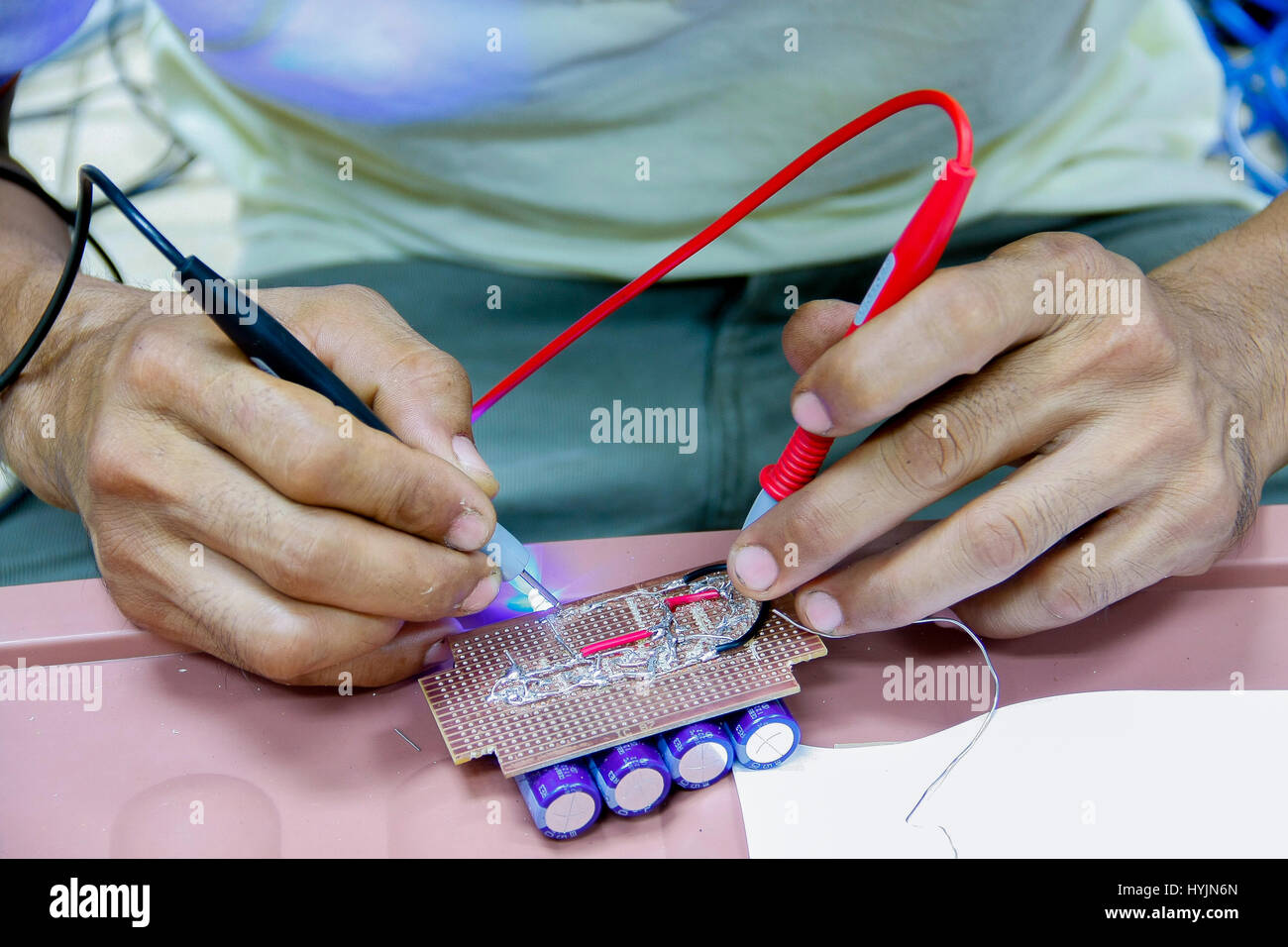 Electronics technician measurement circuit on electronic panel Stock ...